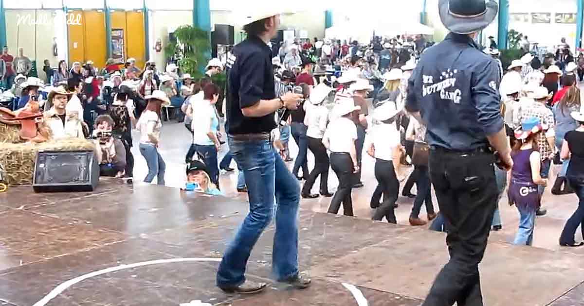 Two cowboy buddies do a jig that draws a big crowd - Country Bucket